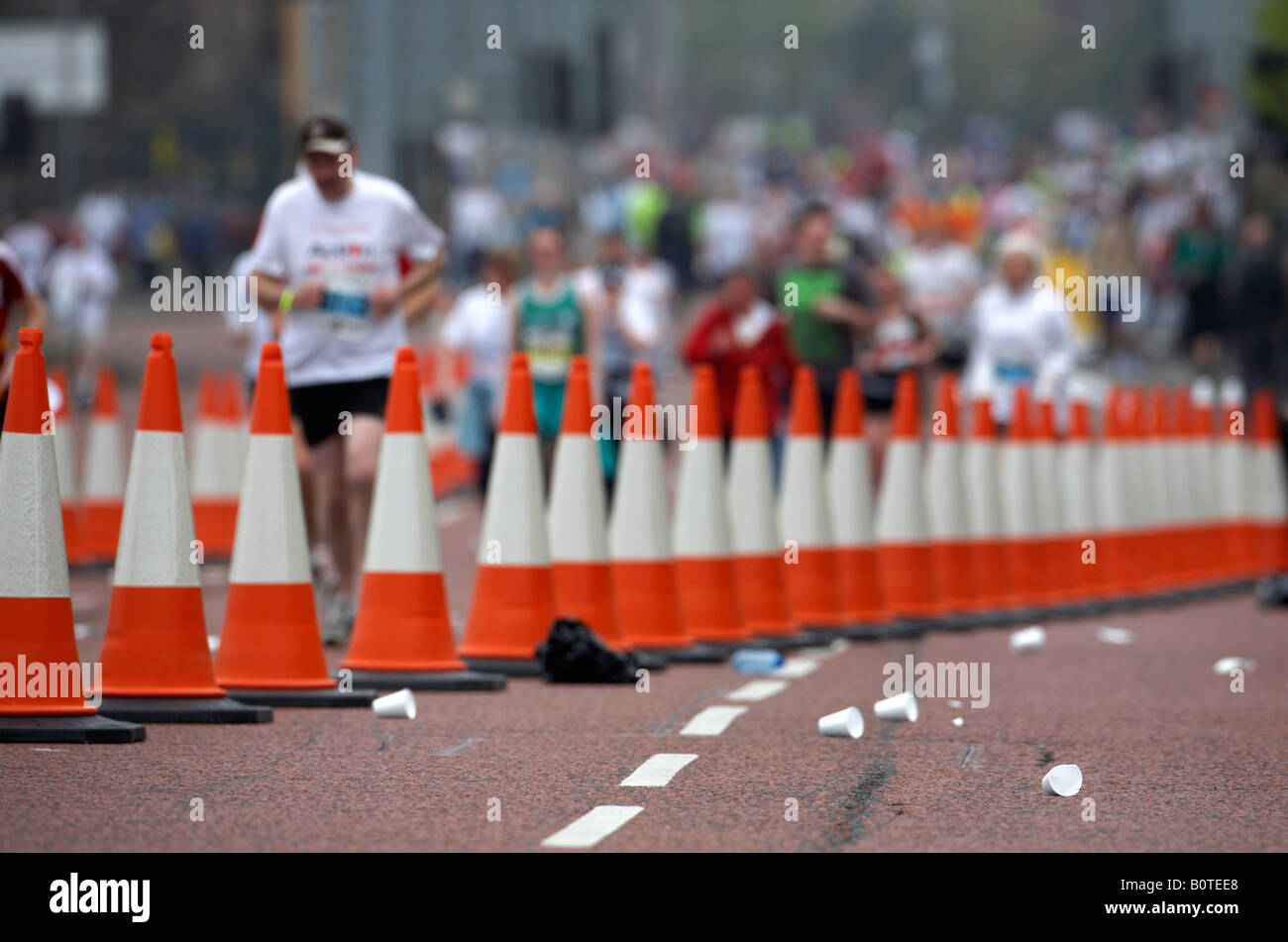 discarded polystyrene styrofoam cups by the side of the road in coned ...