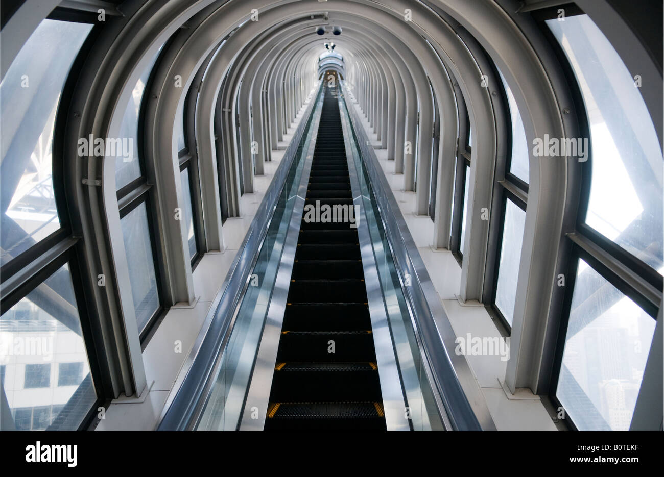 Glass encased escalator at the Umeda Sky Building Osaka Japan Stock ...