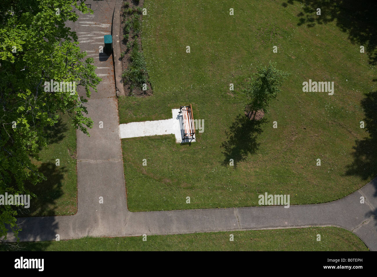 aerial view of parkland including pathway bench litter bin lawns trees ...