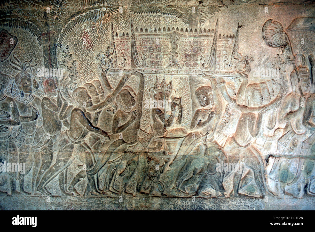 A detail from a frieze depicting battle history on the walls of Angkor ...
