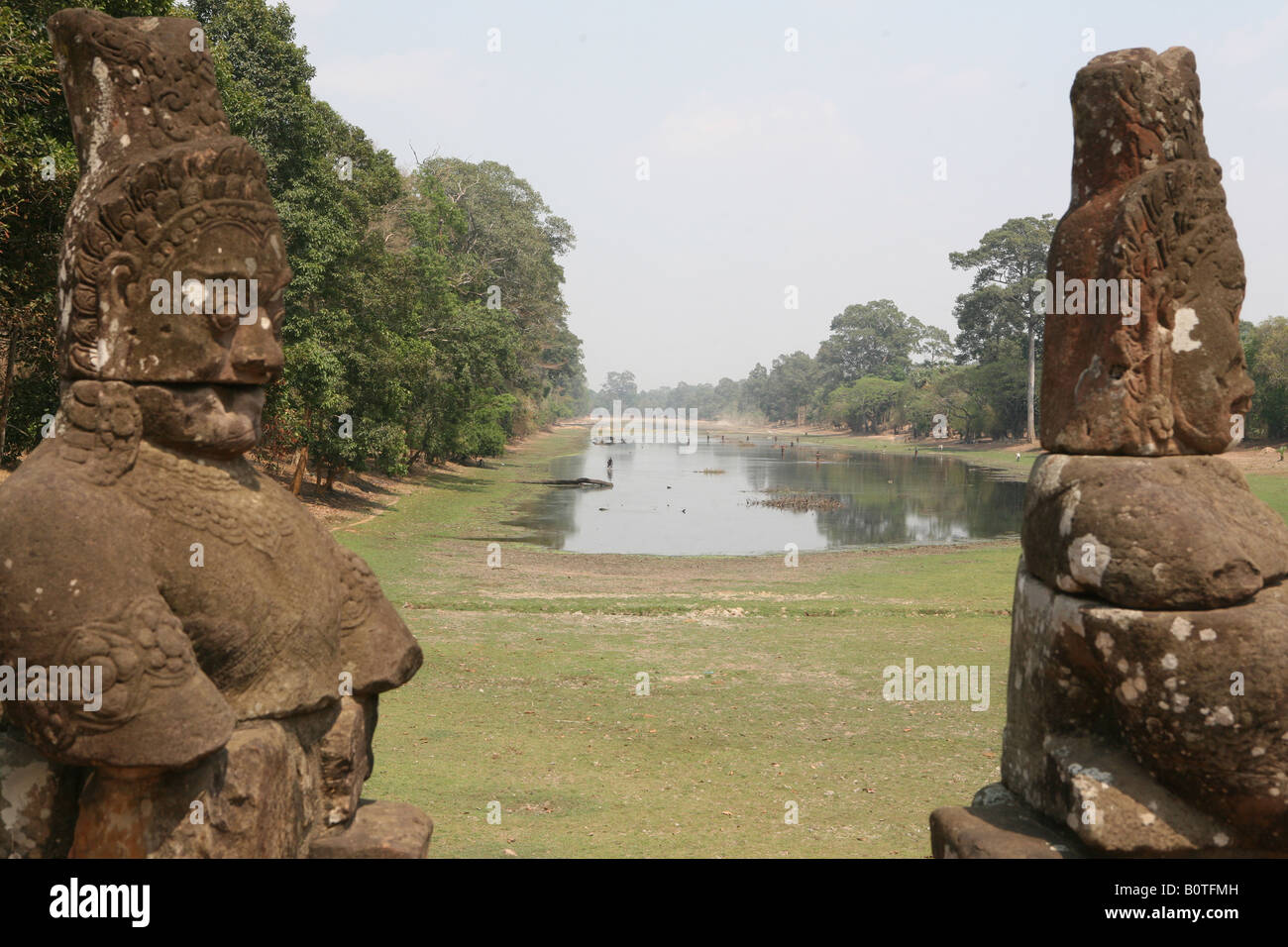 Colossal statues of mythical beings beside the 100metre wide moat next ...