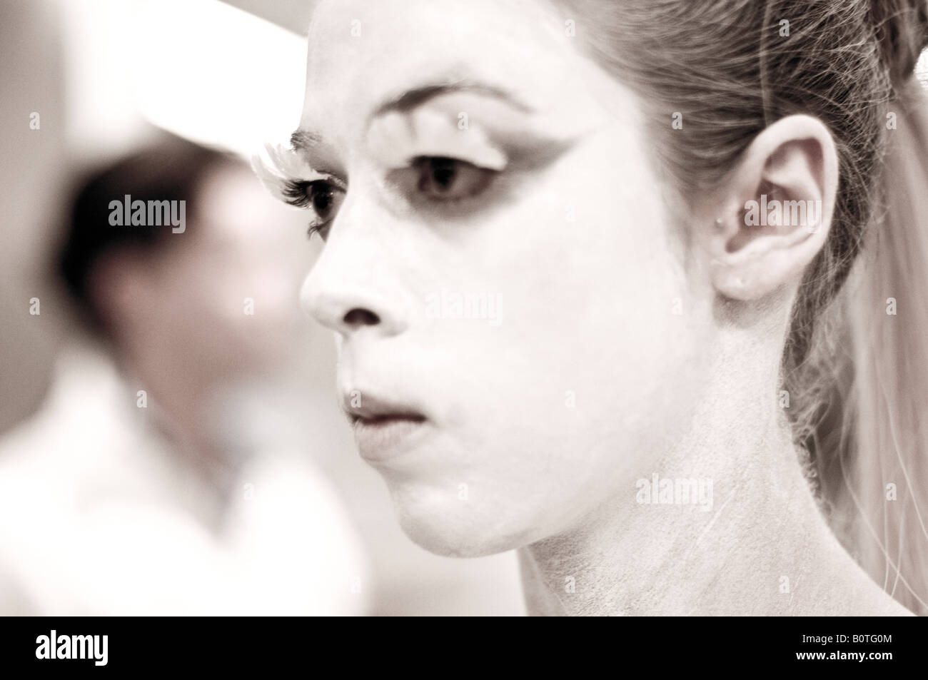 actress performing mimic with white make up and fake eyelush Stock ...