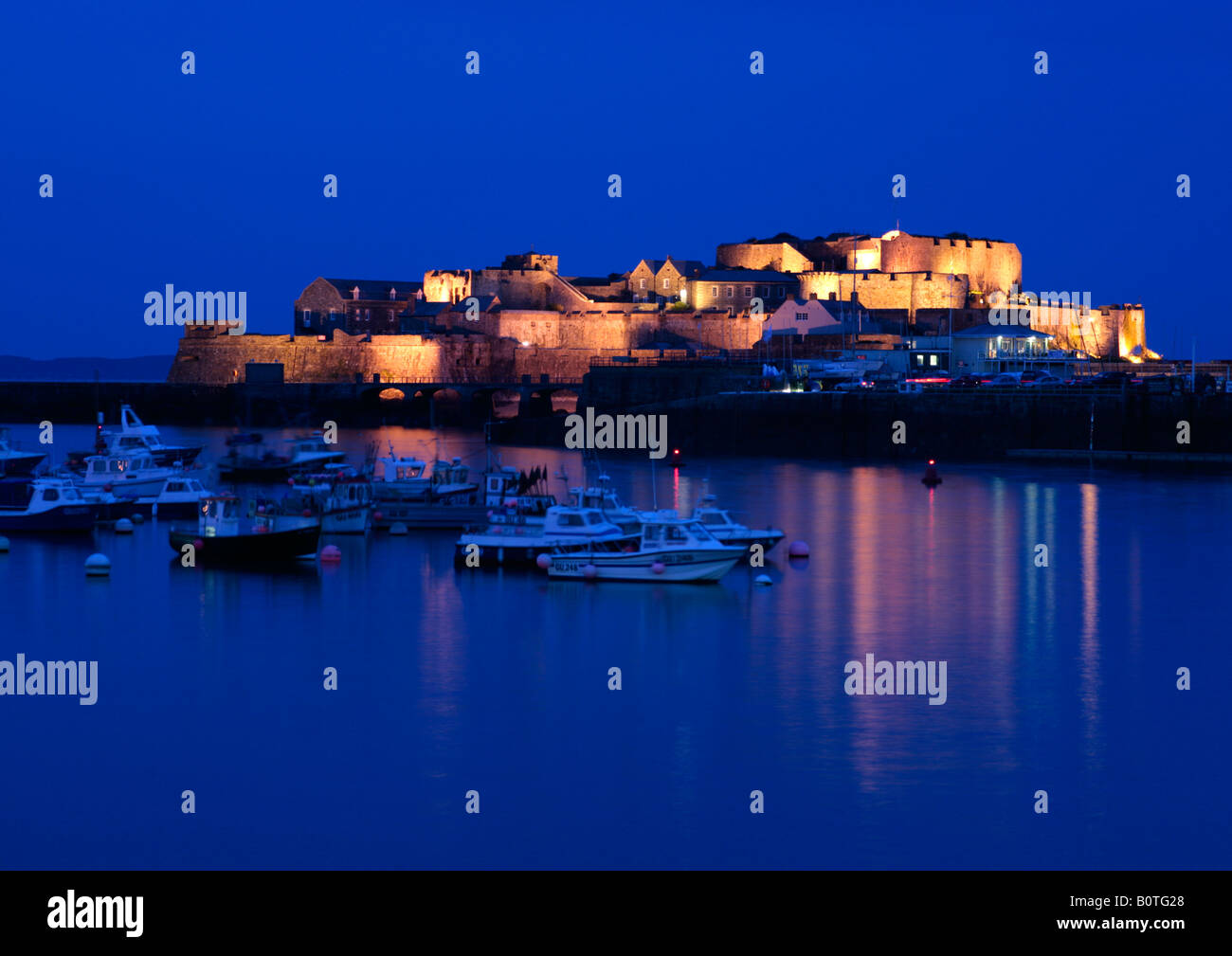 illuminated castle Castle Cornet Stock Photo - Alamy