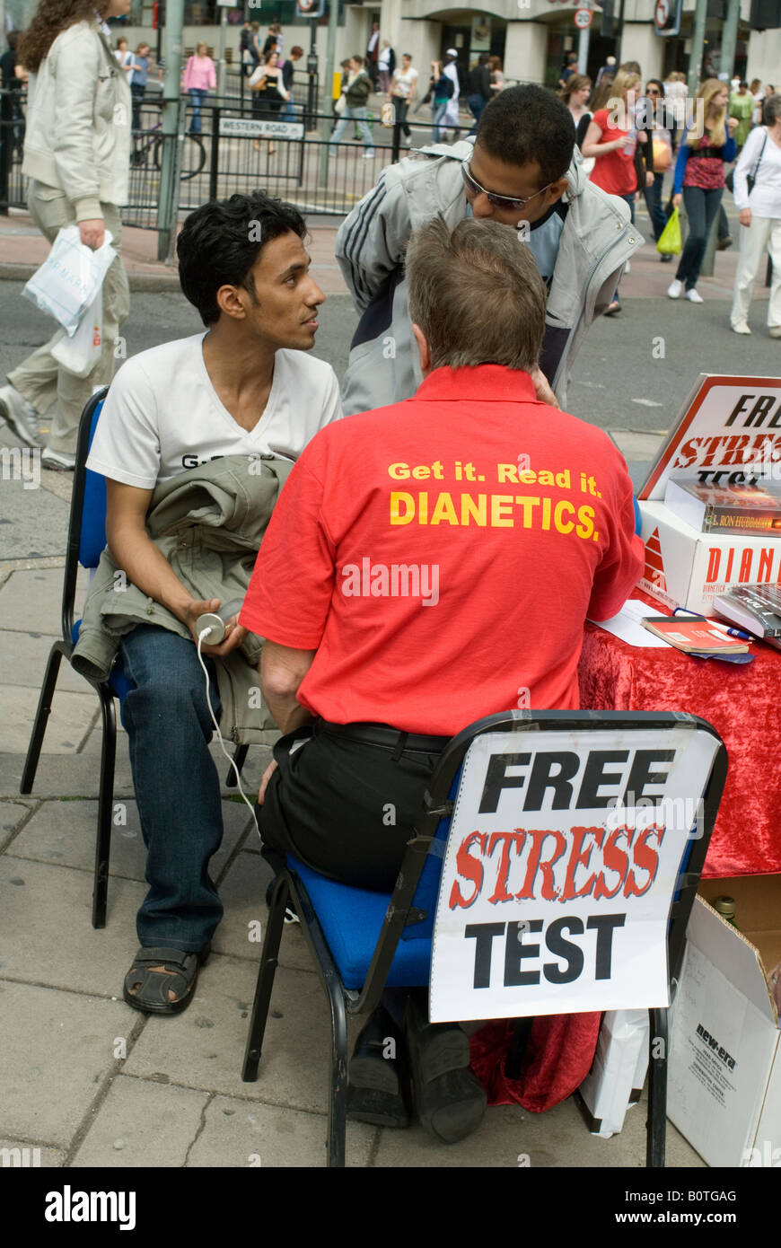 Scientologists offer free stress tests to shoppers on a busy Saturday ...