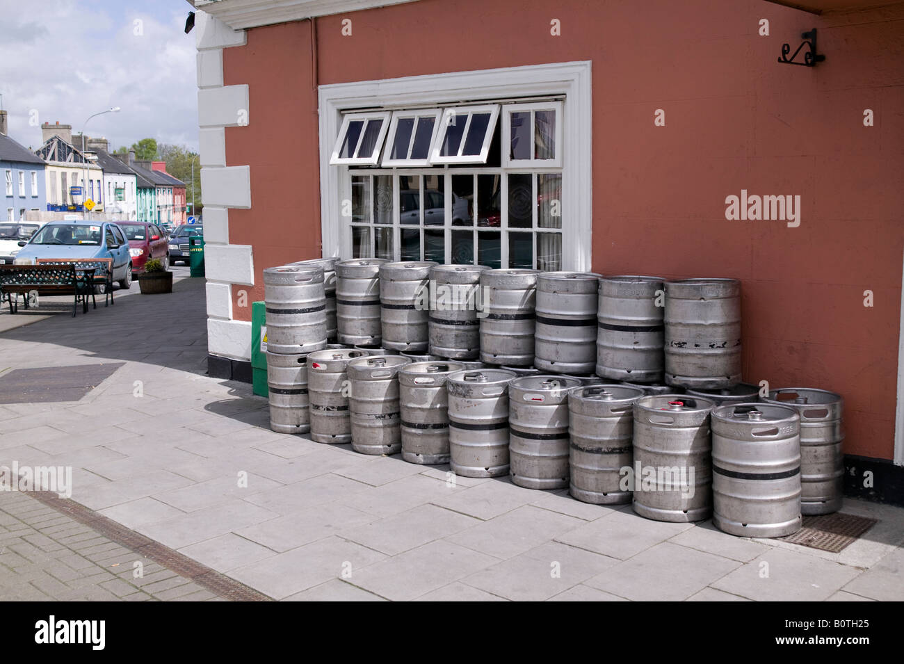 Kegs of beer lined up outside a bar in Adare Ireland Stock Photo - Alamy