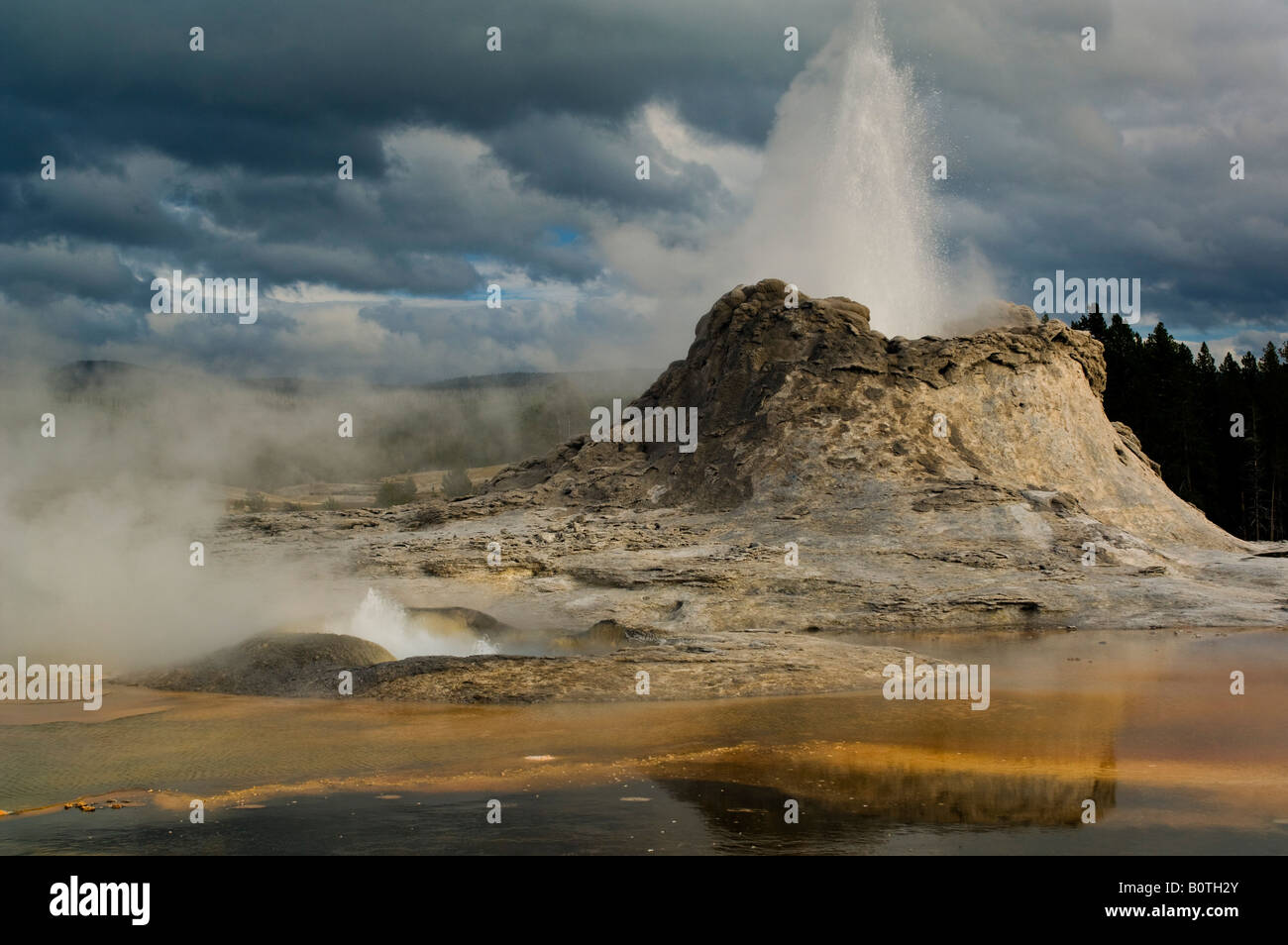 Geothermal steam and water venting out of Castle Geyser Upper Geyser ...