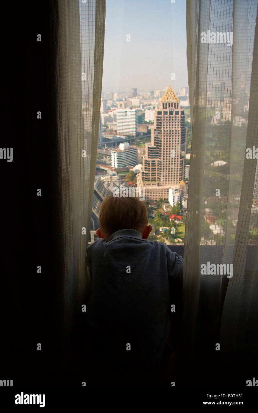 Child looking out of window silhouette hi-res stock photography and ...