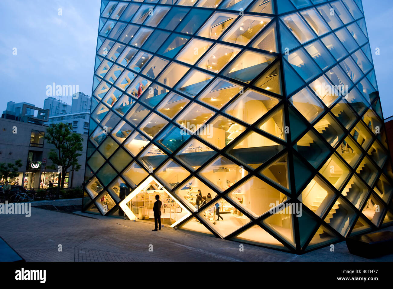 Evening view of beautiful glass walled Prada store in Tokyo 2008 Stock ...