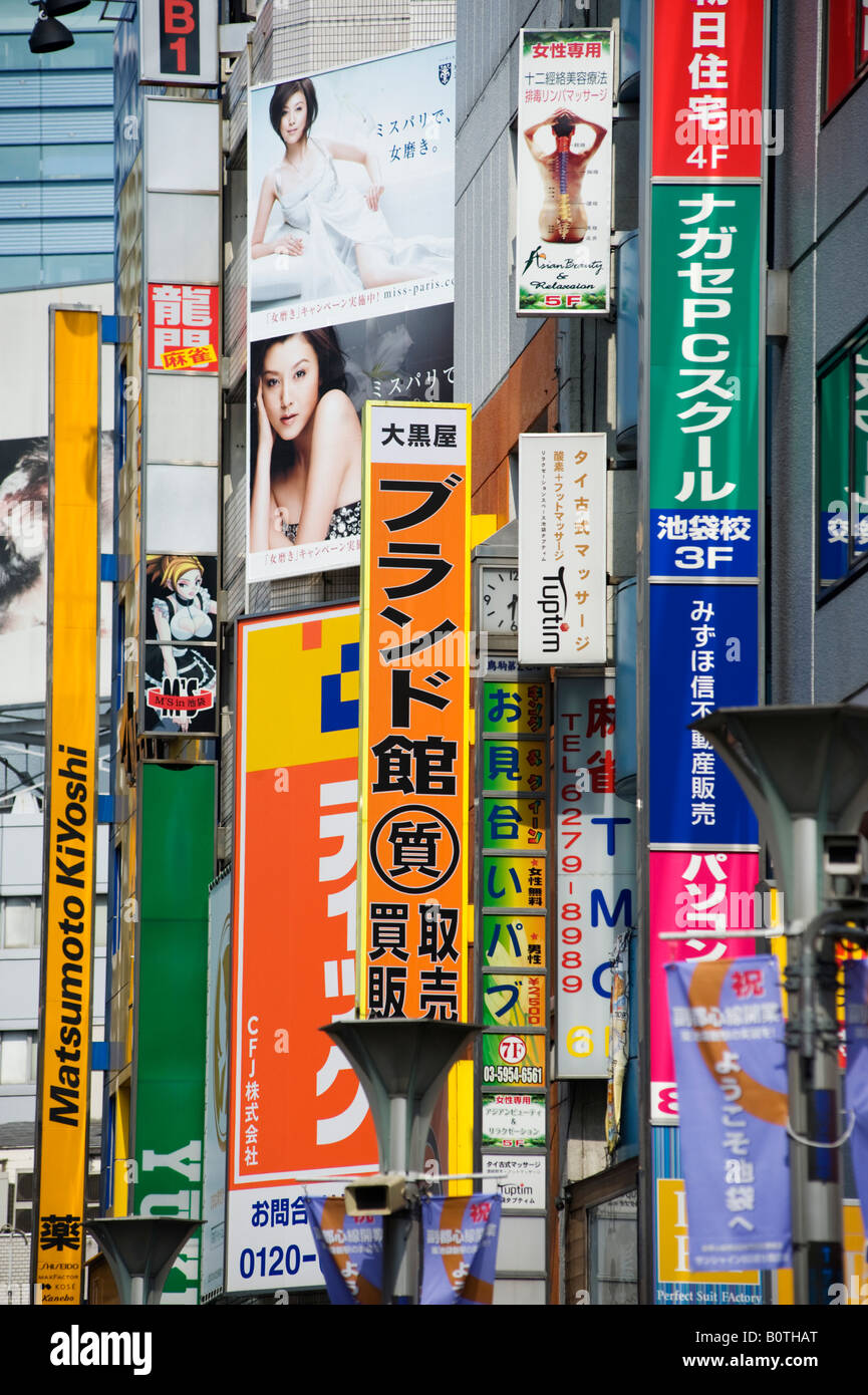 Many colourful signs outside shops and restaurants in Sunshine Dori ...