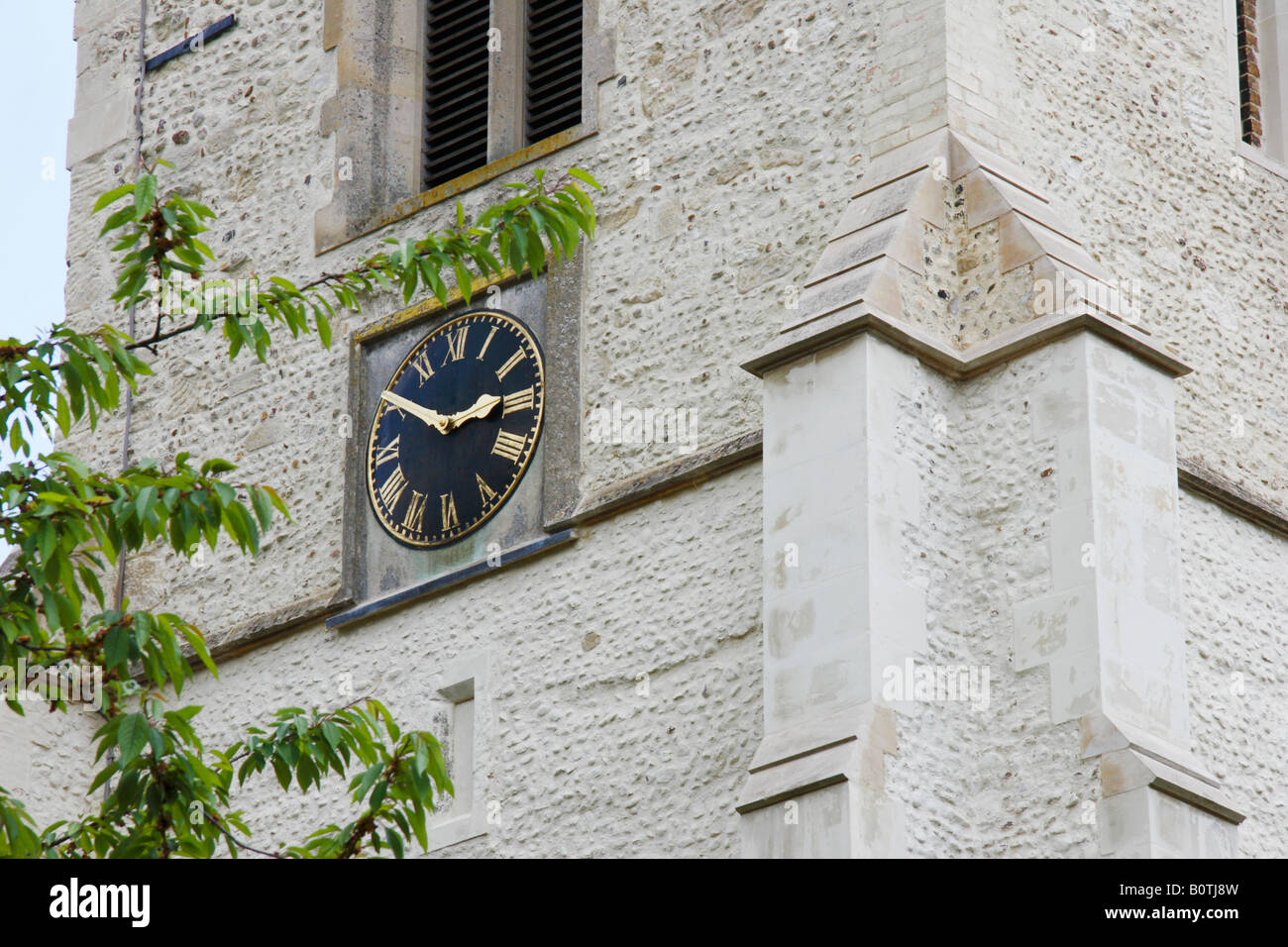 Grantchester church clock at 10 to 3 Stock Photo - Alamy