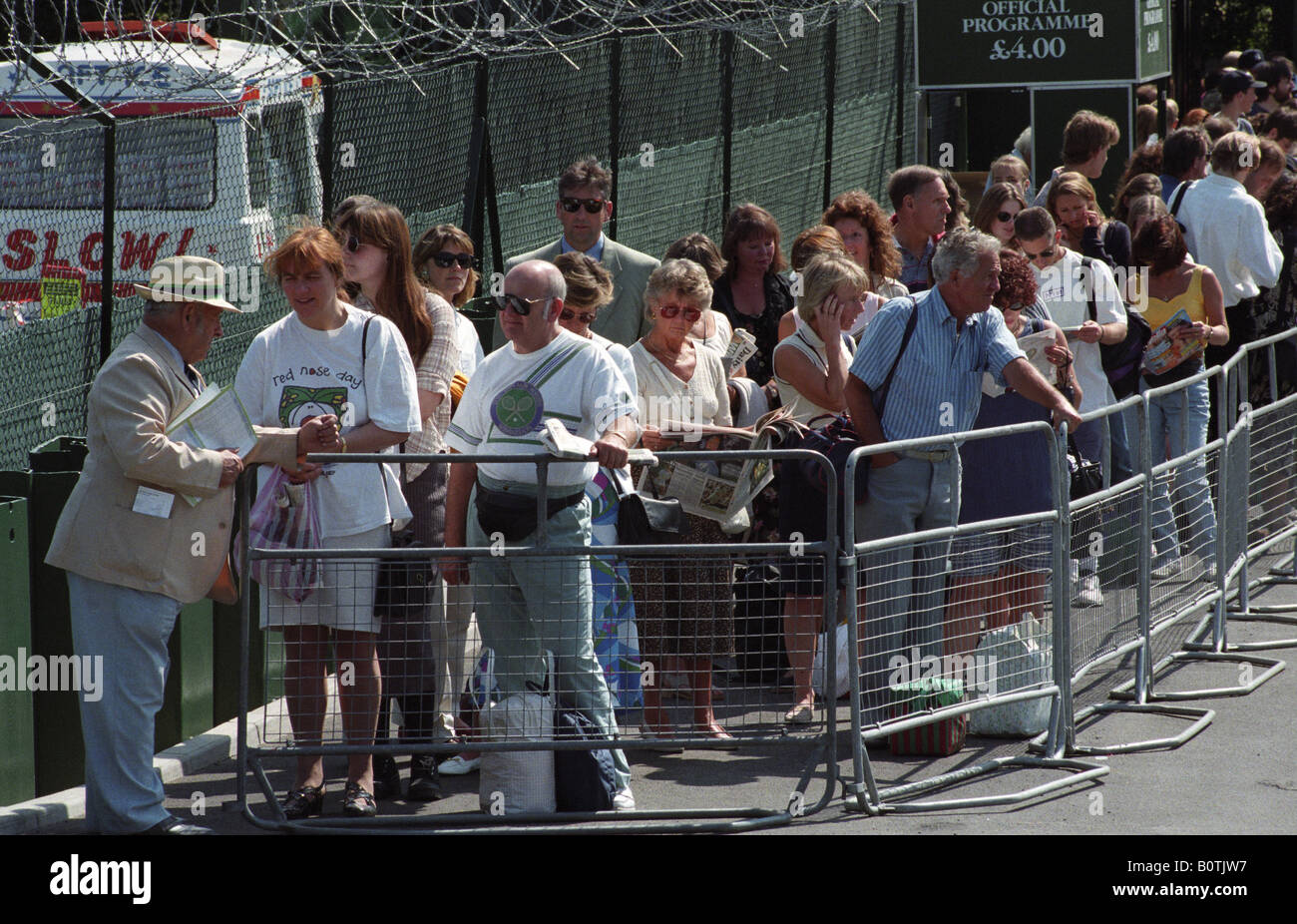 Queue of people 1990s hi-res stock photography and images - Alamy