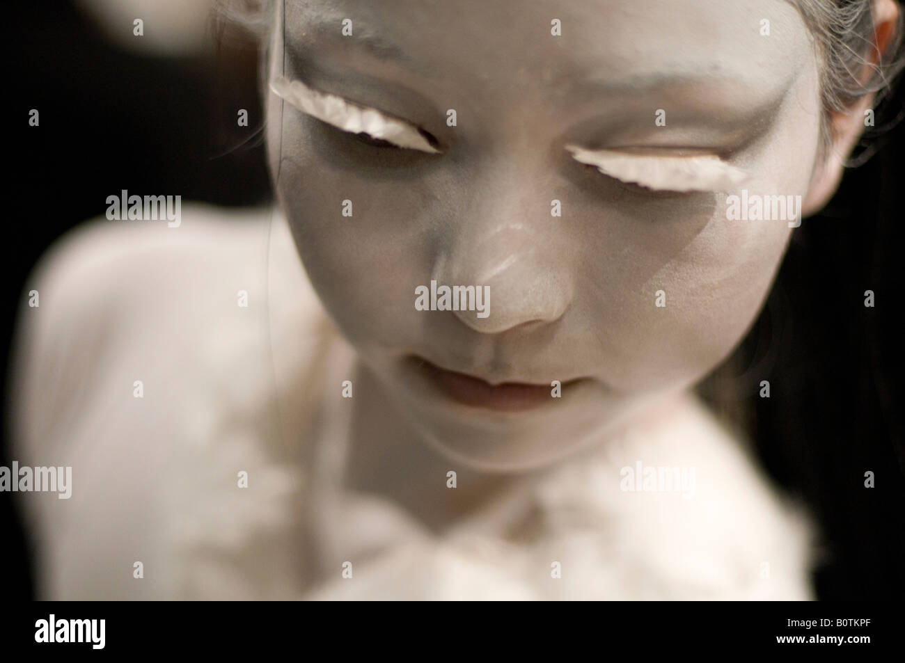 actress performing mimic with white make up and fake eyelush Stock ...