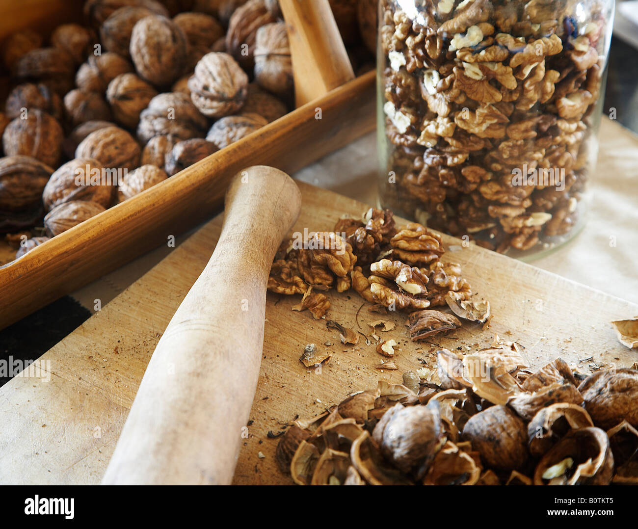 whole walnuts been cracked to remove the kernel from inside on chopping ...