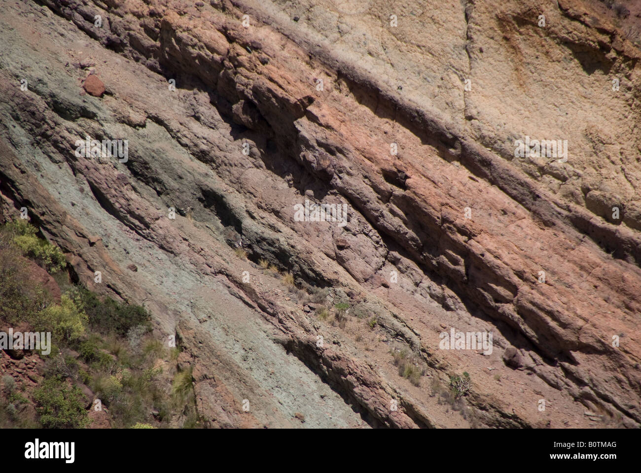 Coloured volcanic rocks Stock Photo - Alamy