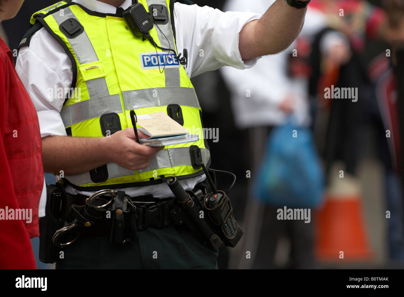 PSNI police service northern ireland policeman officer in high vis ...