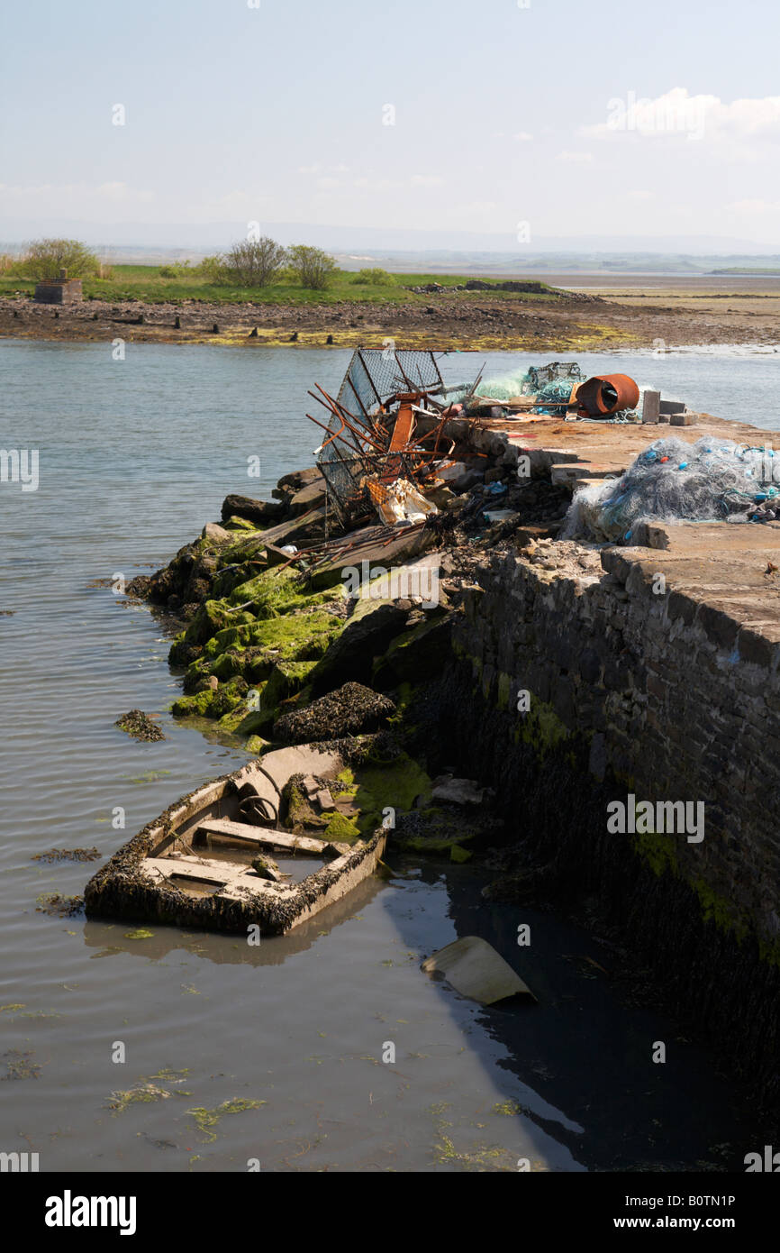 abandoned dangerous collapsed pier with sunken rowboat county mayo ...