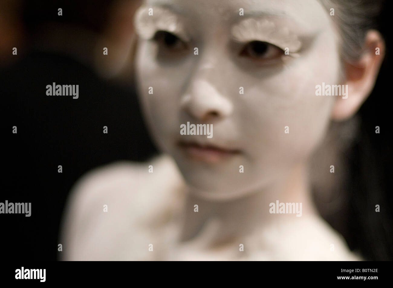 actress performing mimic with white make up and fake eyelush Stock ...