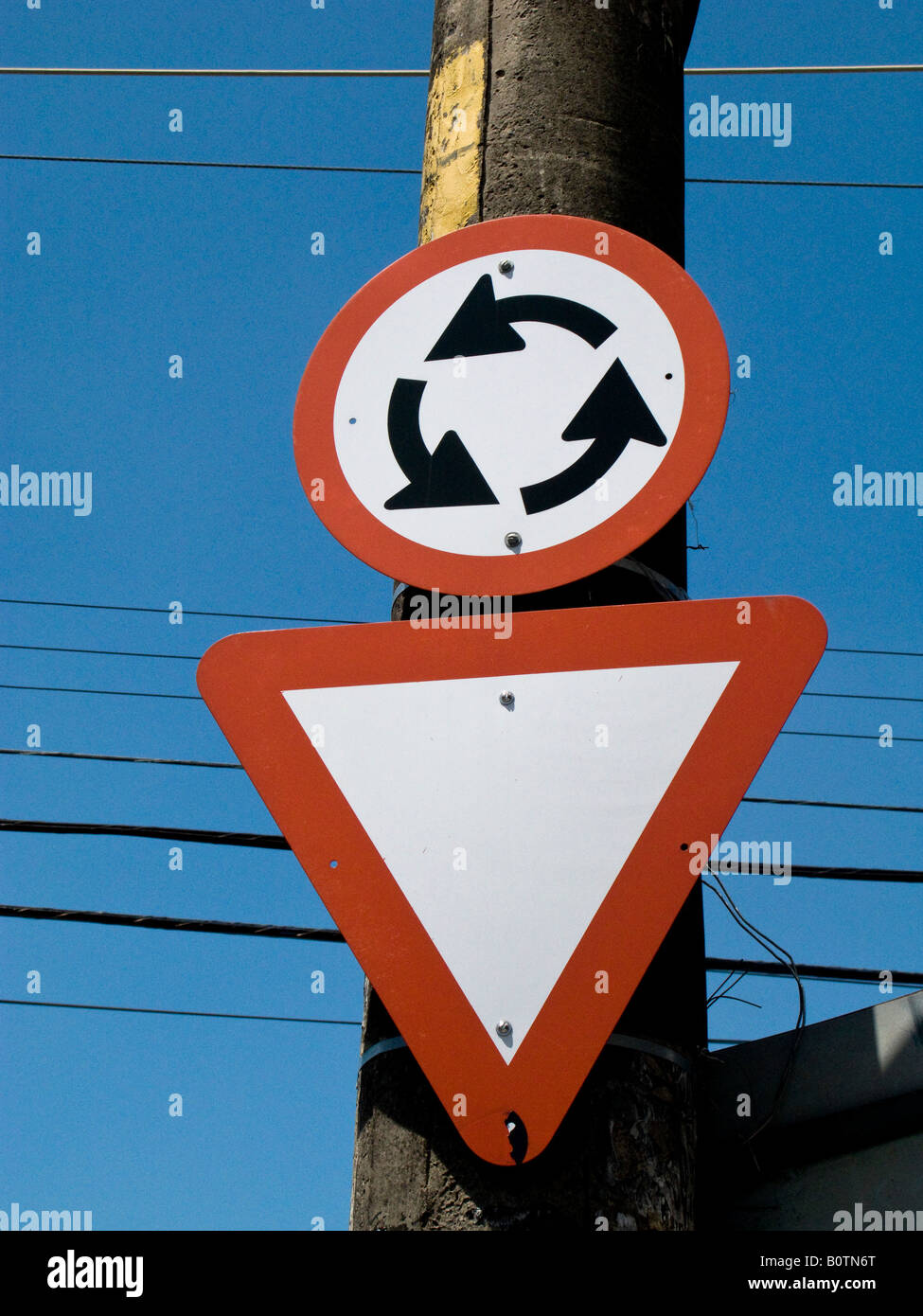 Round about and give way signs in the city of Sao Paulo SP Brazil Stock ...