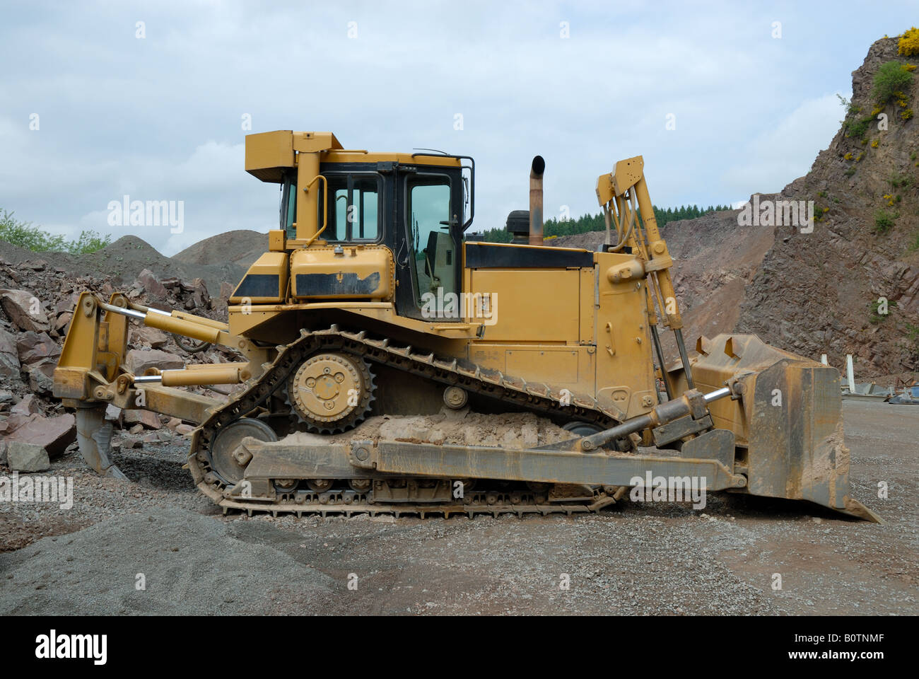 Huge bulldozer in a stone pit Stock Photo - Alamy