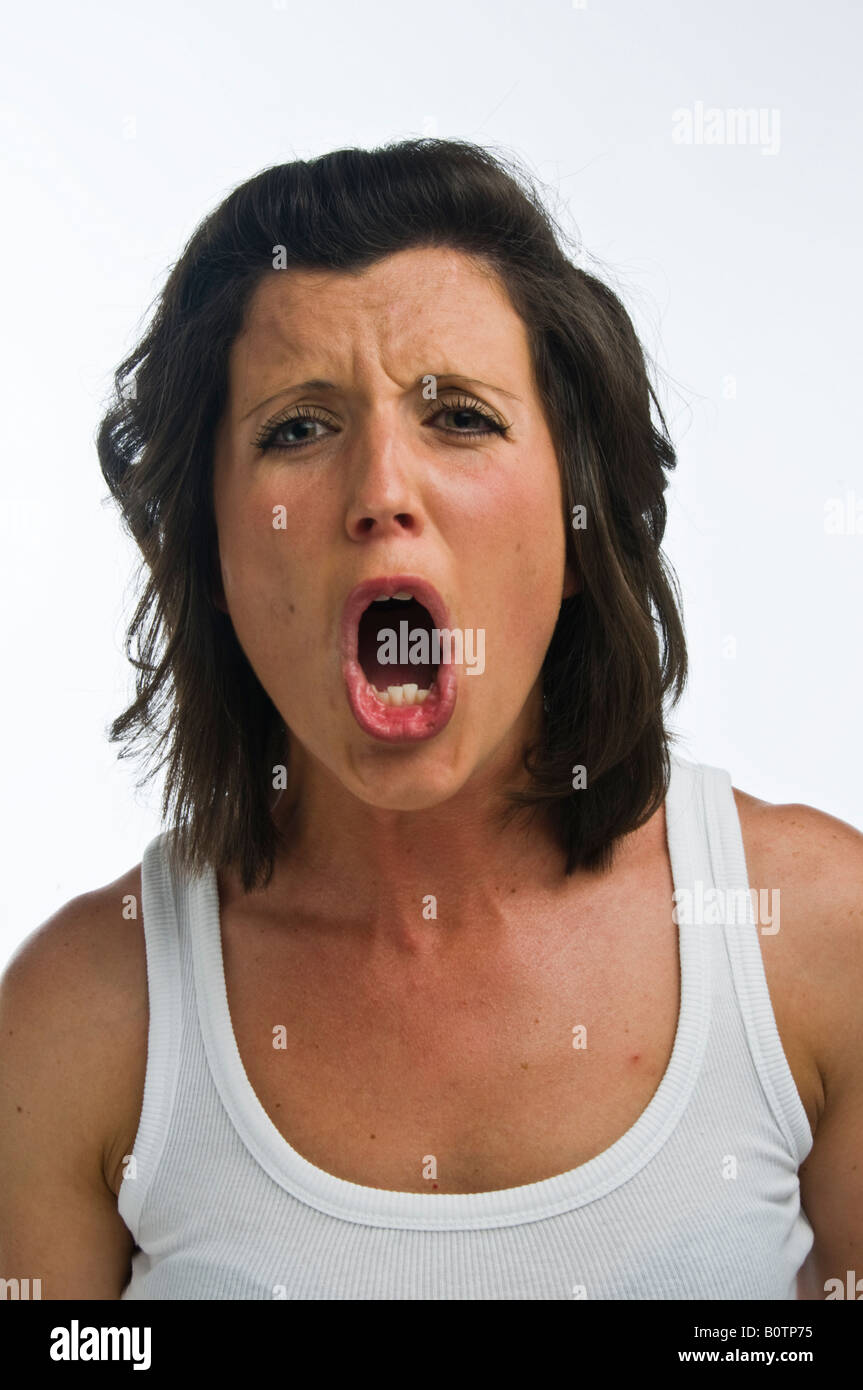 Angry shouting young woman Stock Photo - Alamy