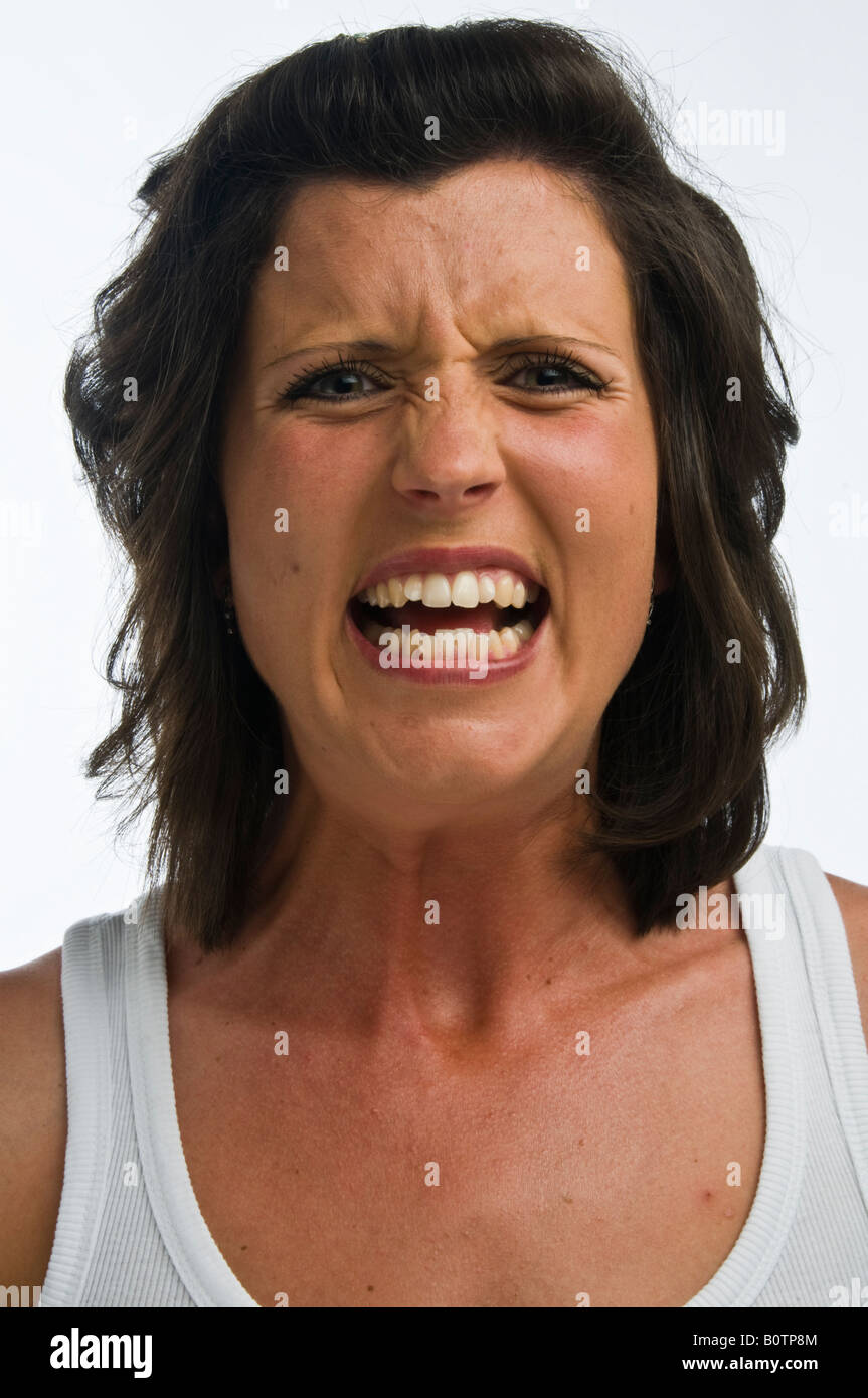 Angry shouting young woman Stock Photo - Alamy