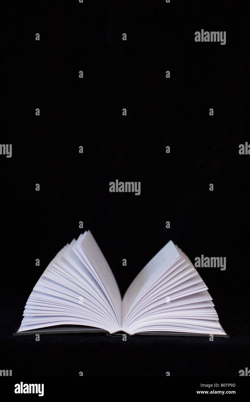 A book on a black background Stock Photo - Alamy