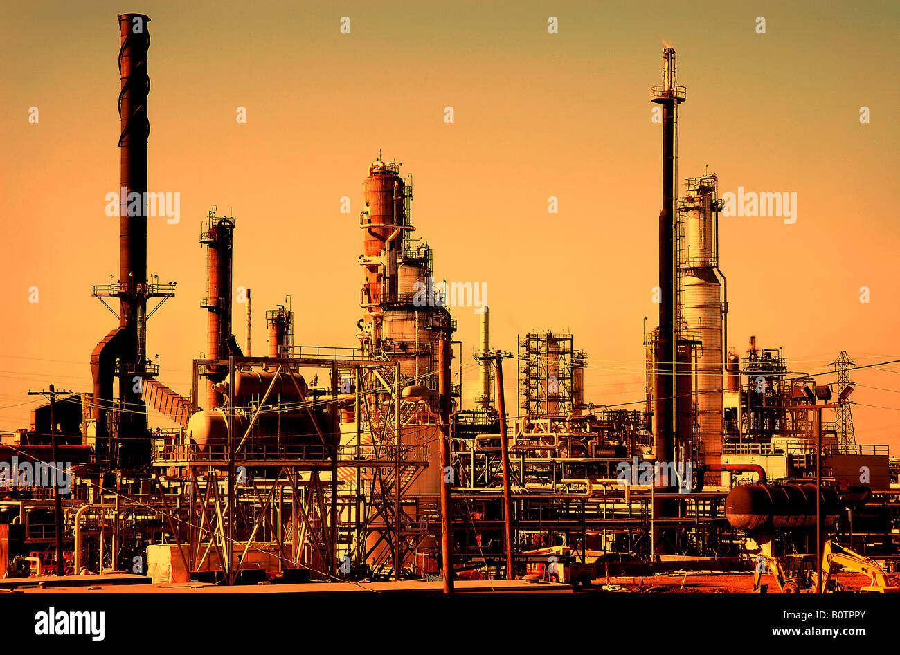 Sunrise Over Refinery Stock Photo - Alamy