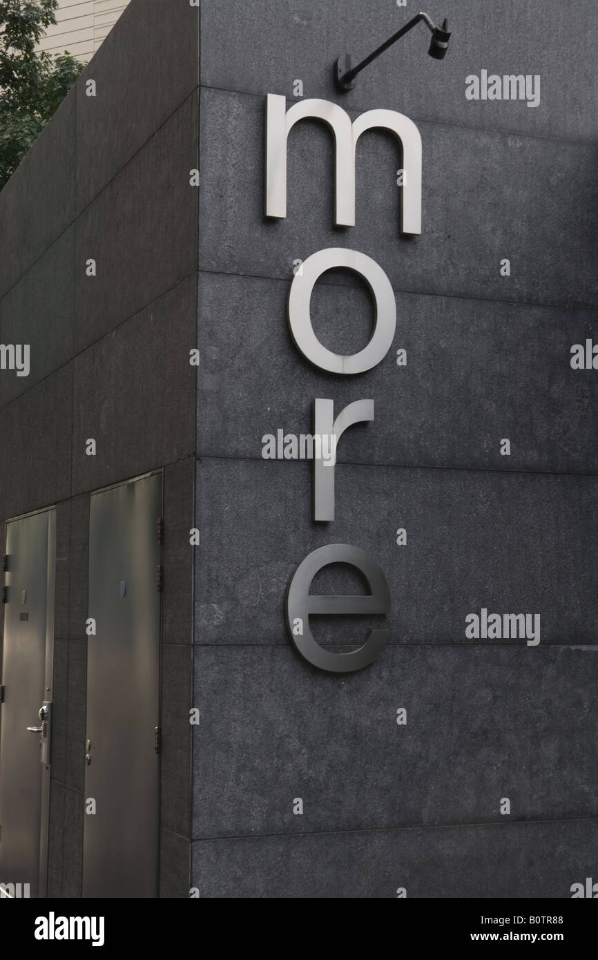 A sign on a wall for More London Stock Photo - Alamy