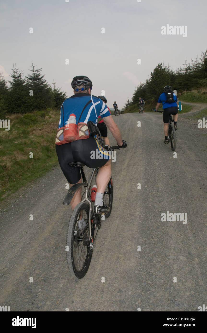 rear view of a cyclist on a mountain bike demonstration weekend at Nant ...