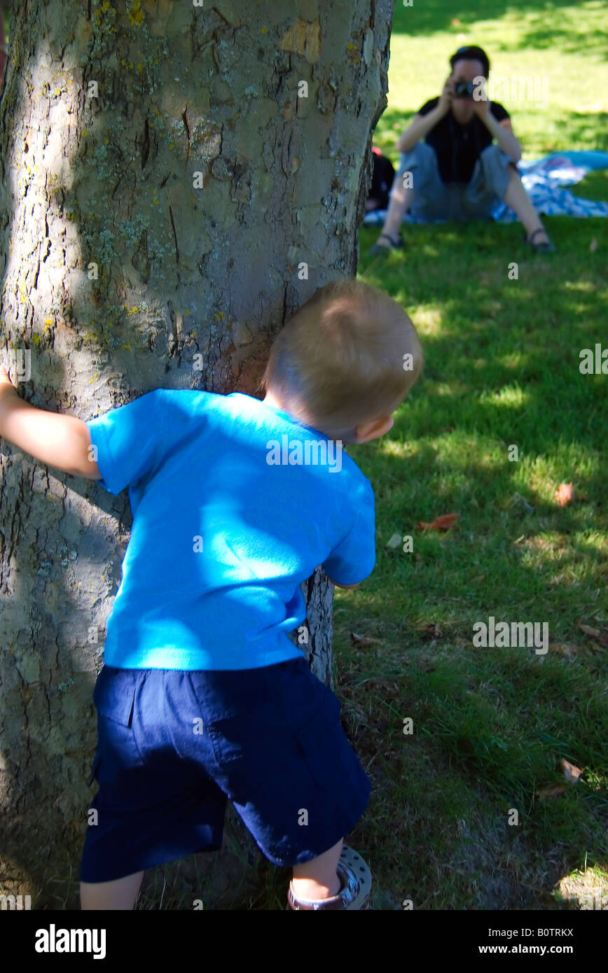 Vancouver Canada Lower Mainland Young Boy Peaking Around a Tree Stock ...