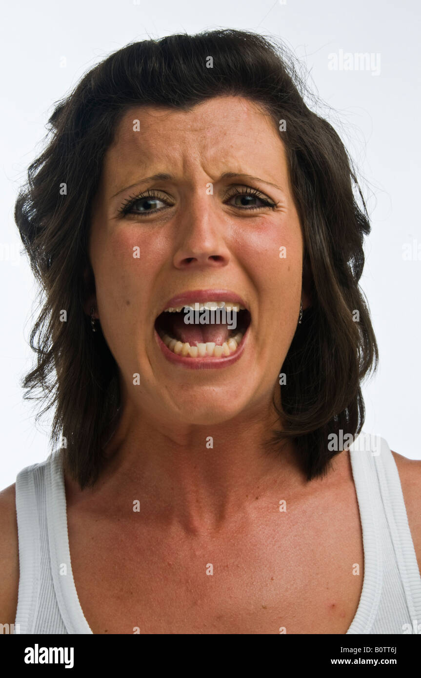 Angry shouting young woman Stock Photo - Alamy