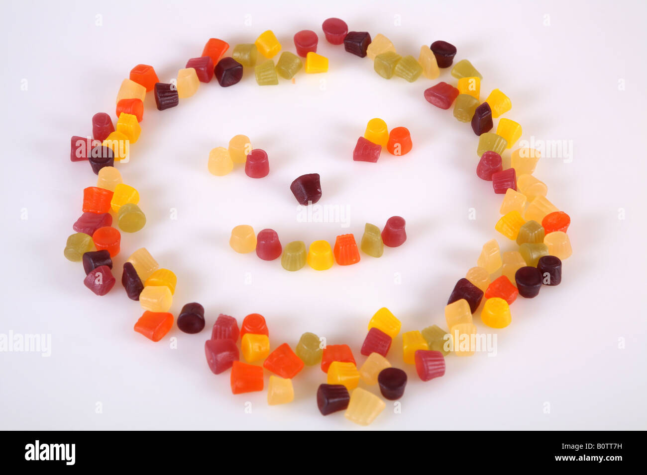 Smiley face made out of sweets Stock Photo - Alamy
