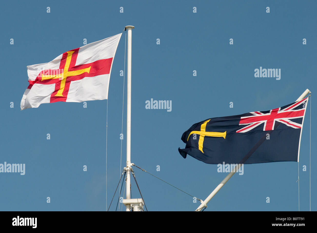 Channel Islands Guernsey flags Stock Photo - Alamy
