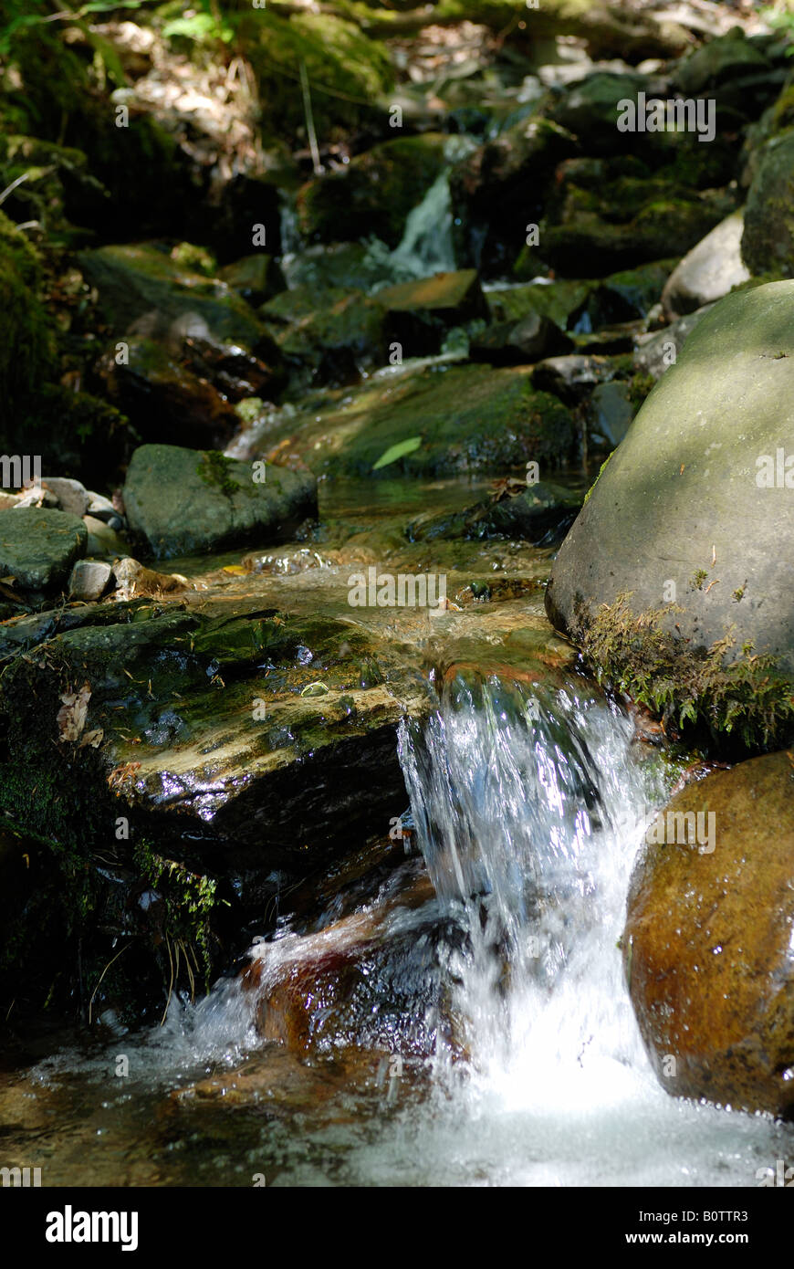 Water tumbling over rocks hi-res stock photography and images - Alamy