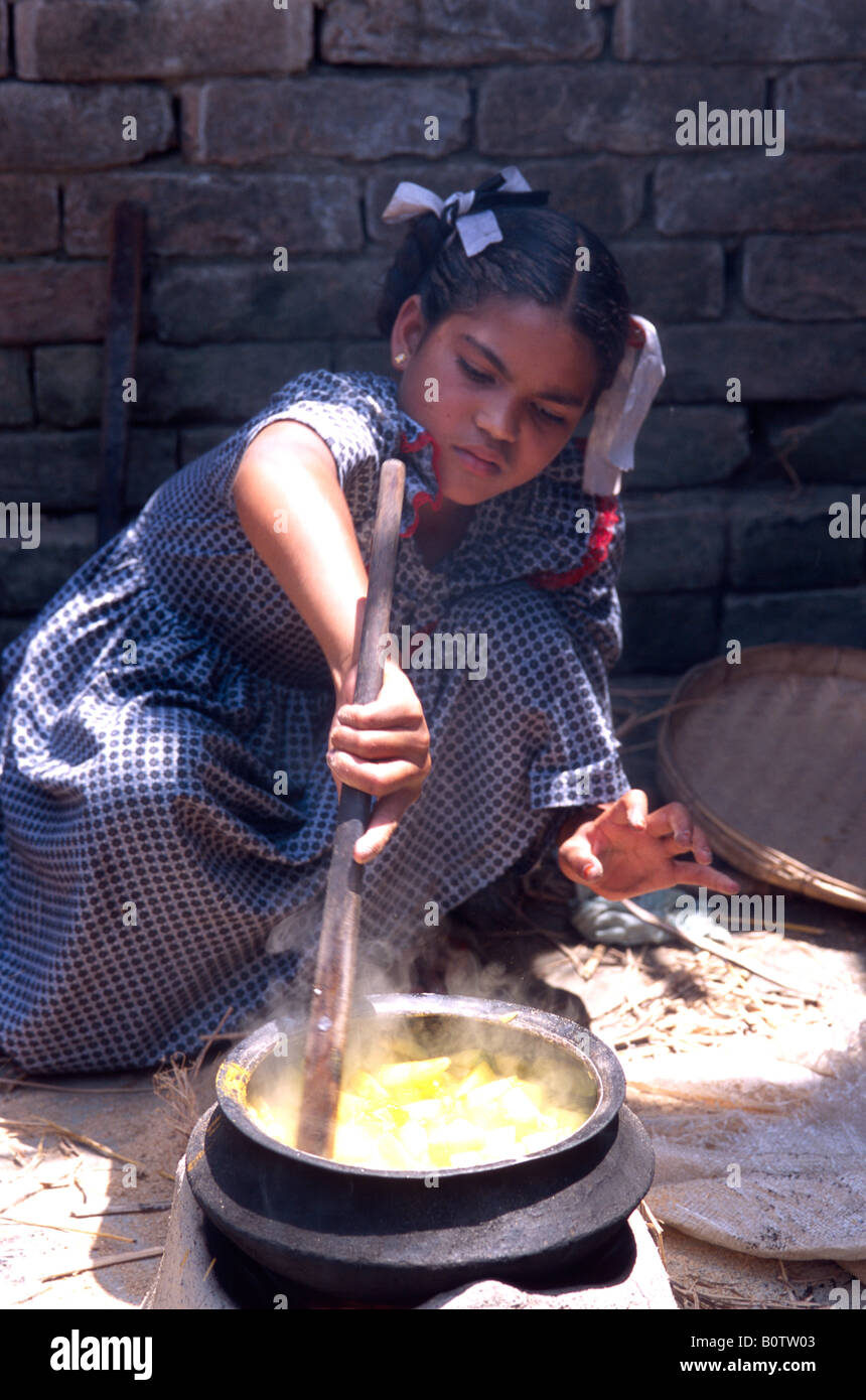 Preparing a meal rural Bangladesh Stock Photo - Alamy