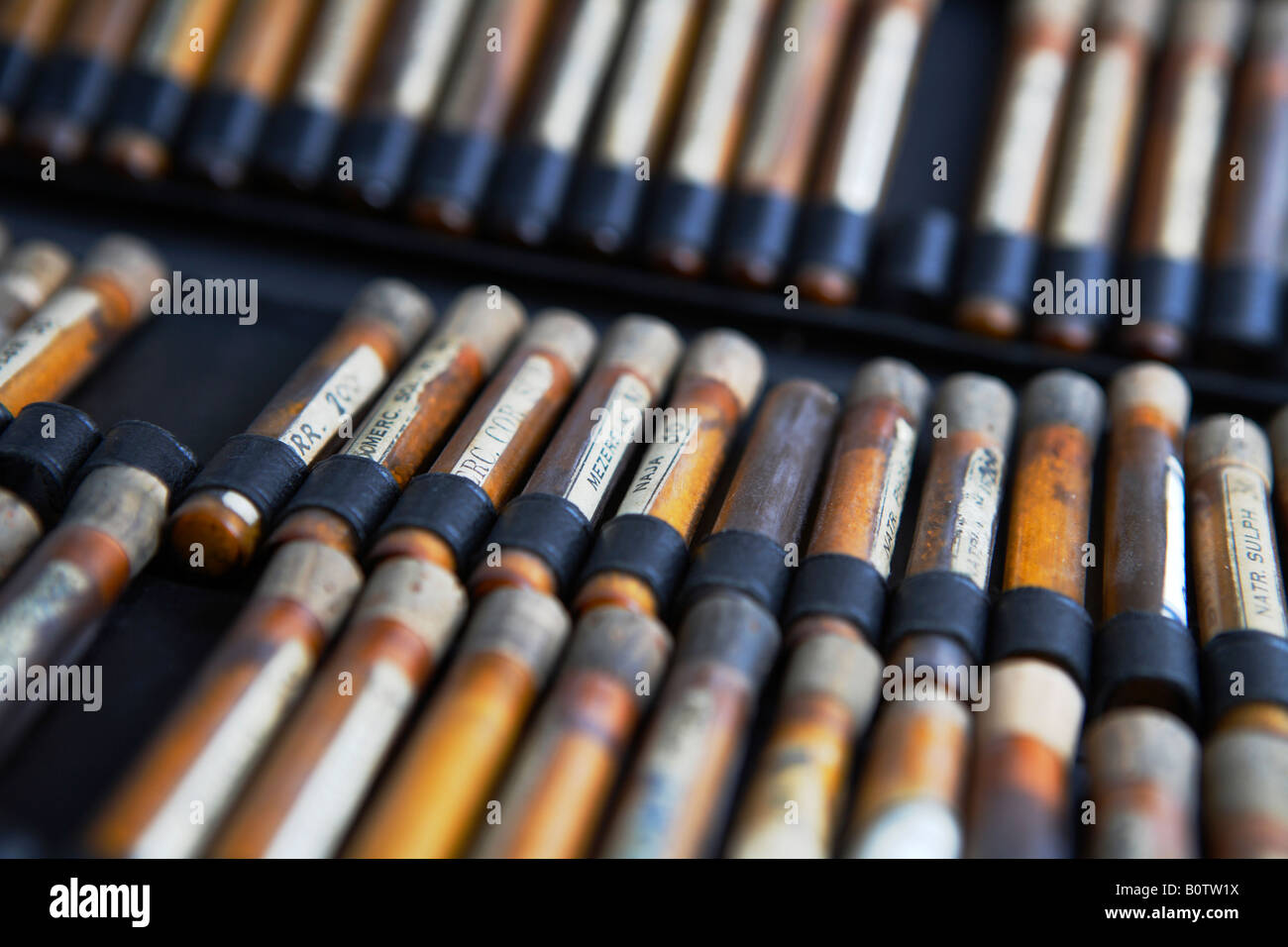 Old vials of homeopathic medication, in a row, close up Stock Photo - Alamy