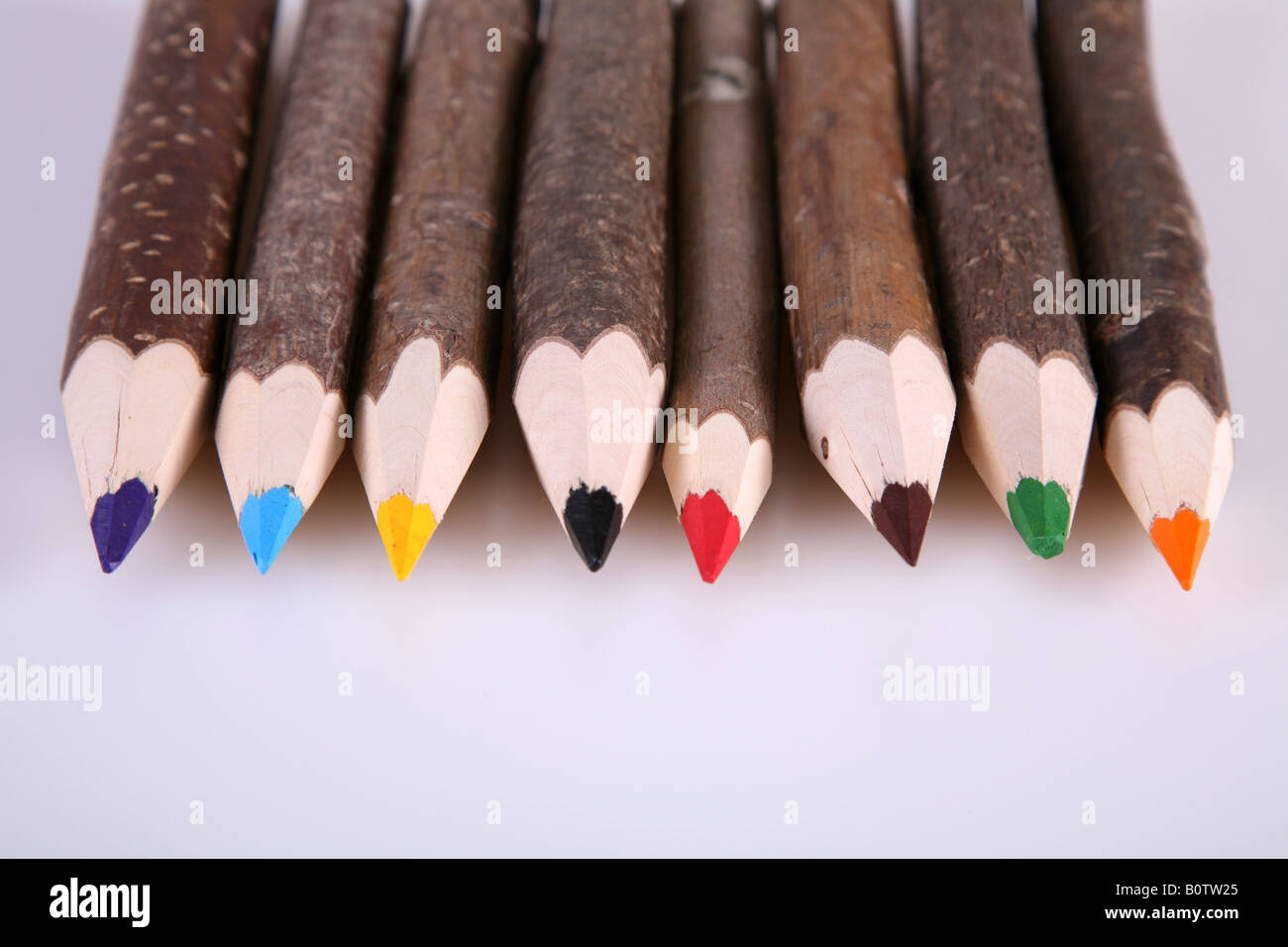 Eight wooden Coloured Pencils Stock Photo - Alamy