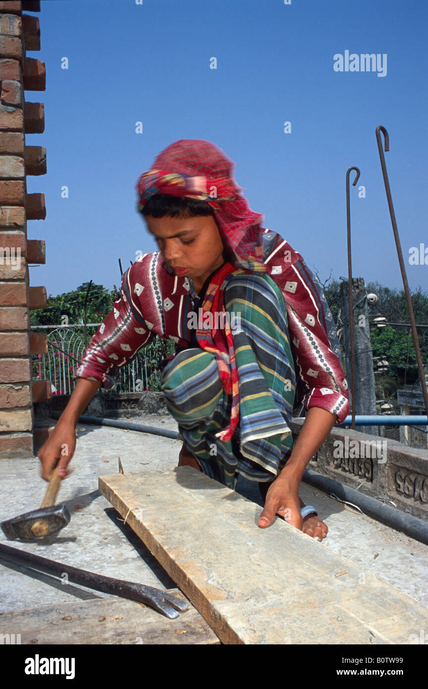 A boy labouring on a construction site in Bangladesh s capital Dhaka ...