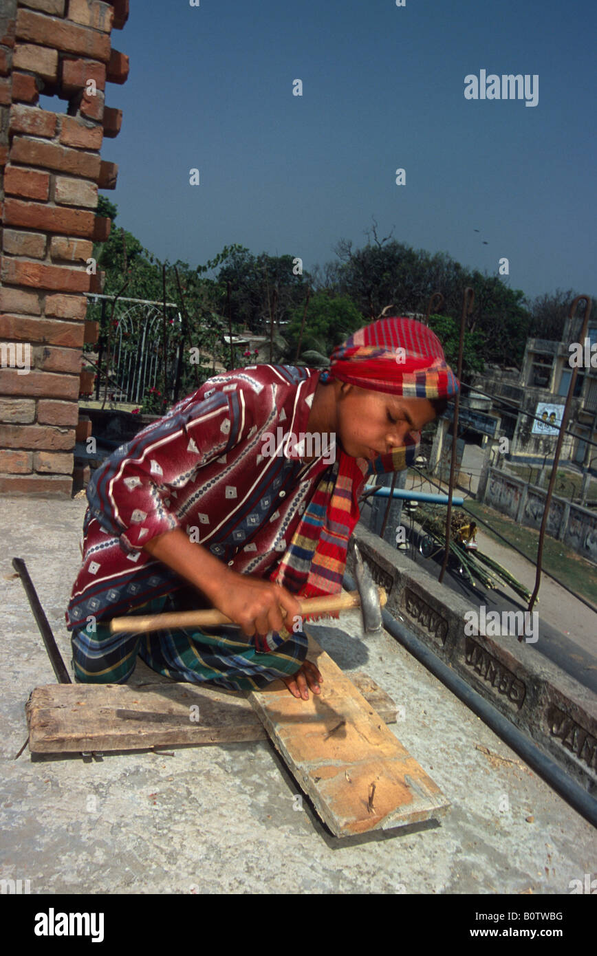A boy labouring on a construction site in Bangladesh s capital Dhaka ...