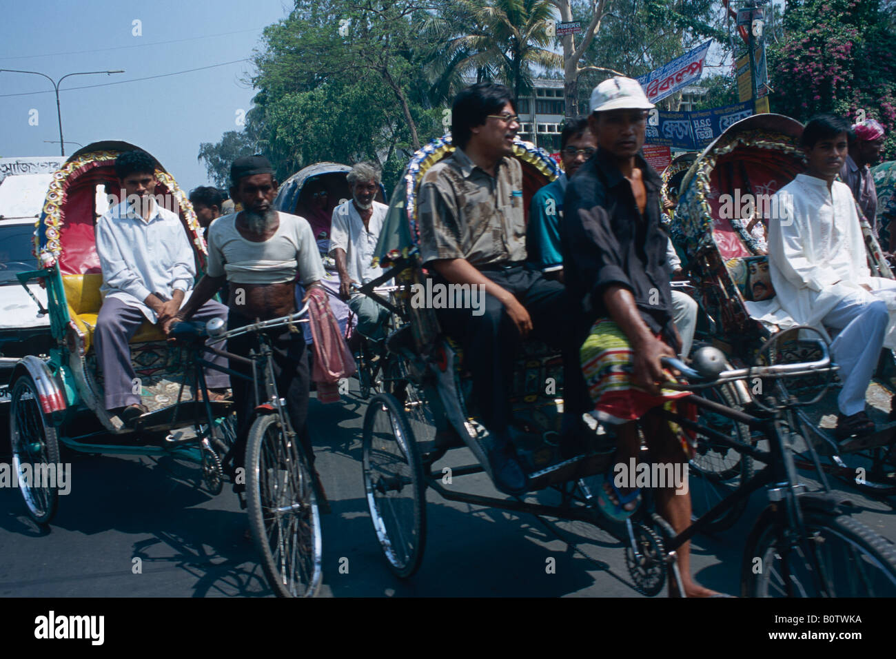 Rickshaws in traffic in Bangladesh s capital Dhaka Stock Photo - Alamy