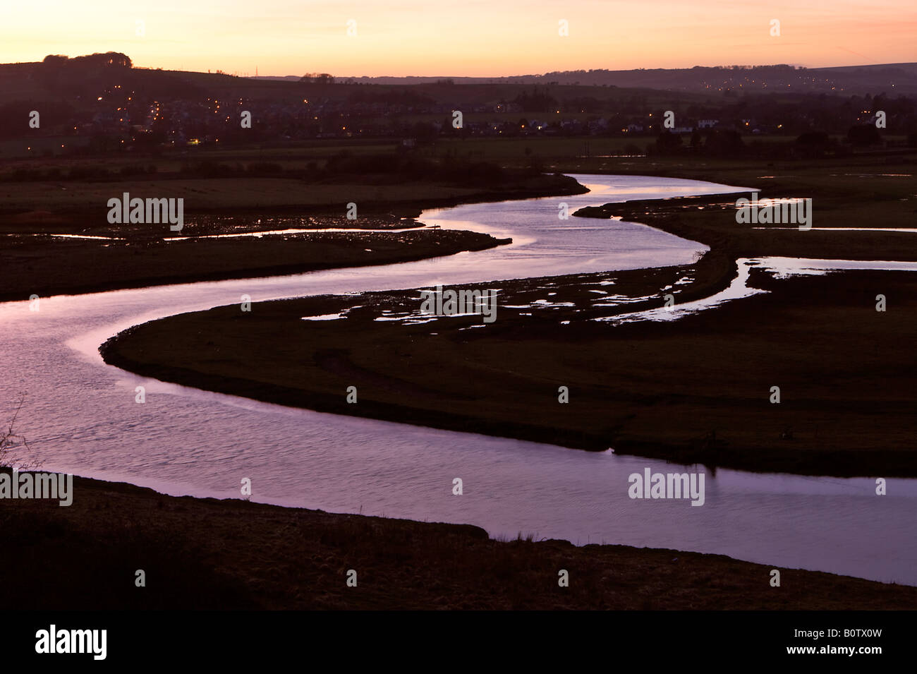 Meandering river aln at alnmouth estuary at dusk Stock Photo - Alamy