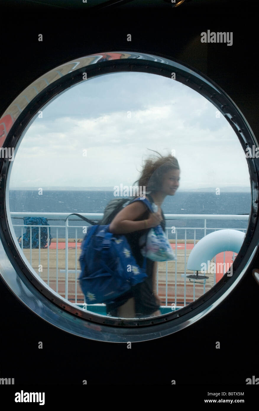 Girl by the porthole hi-res stock photography and images - Alamy