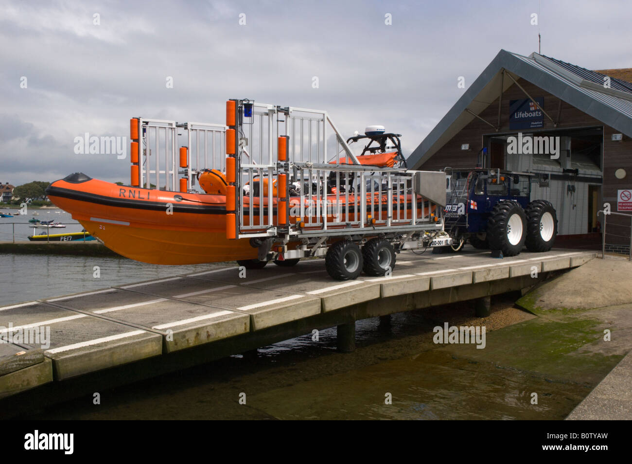 Mudeford lifeboat station showing the RNLI lifeboat and tractor on the ...