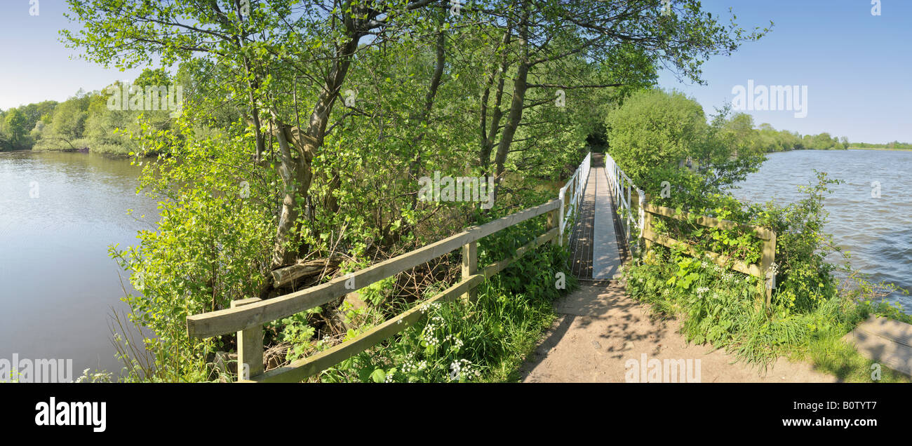 footbridge over a lake or river Stock Photo - Alamy