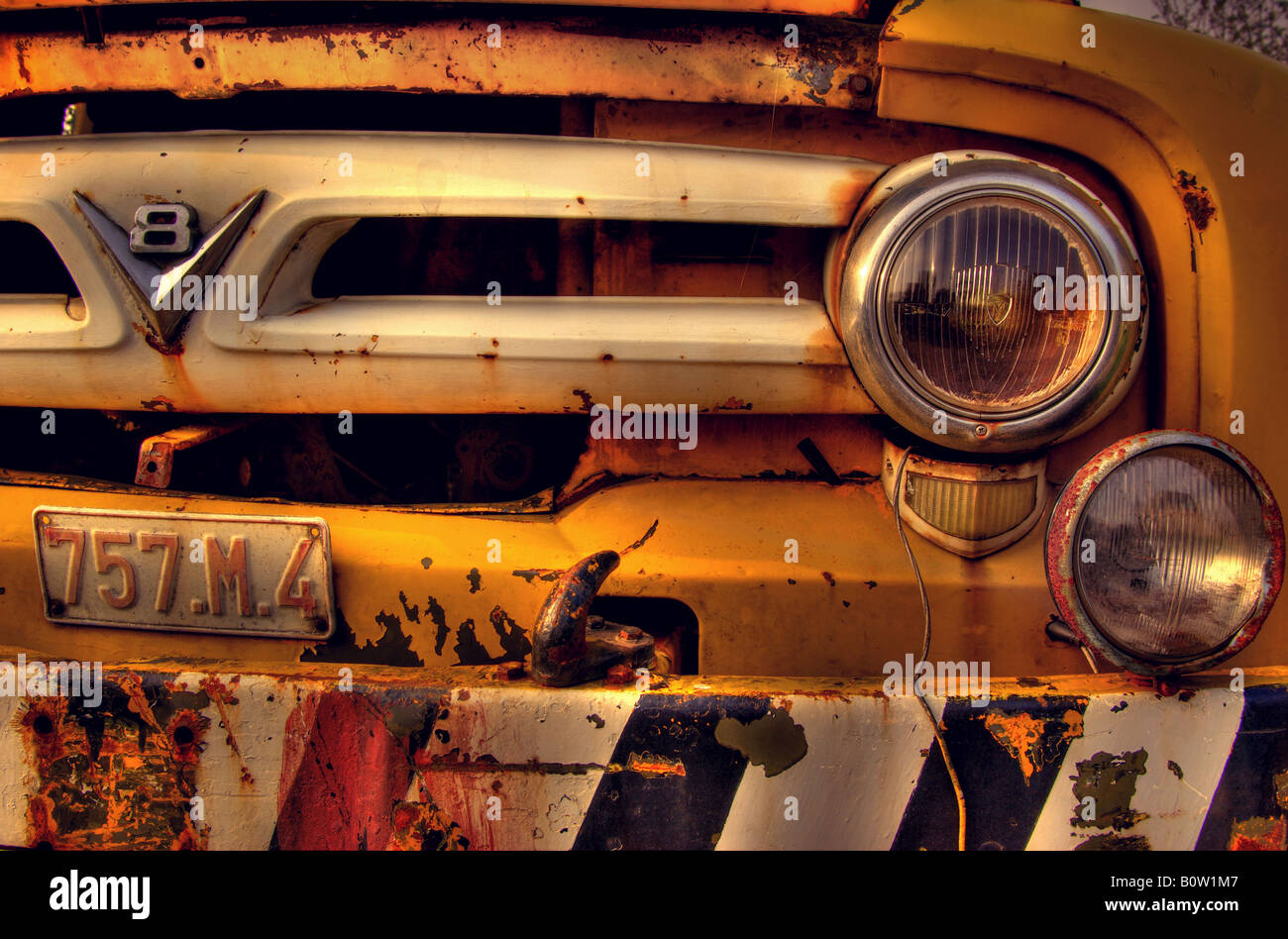 Rusty old yellow truck / car detail Stock Photo - Alamy