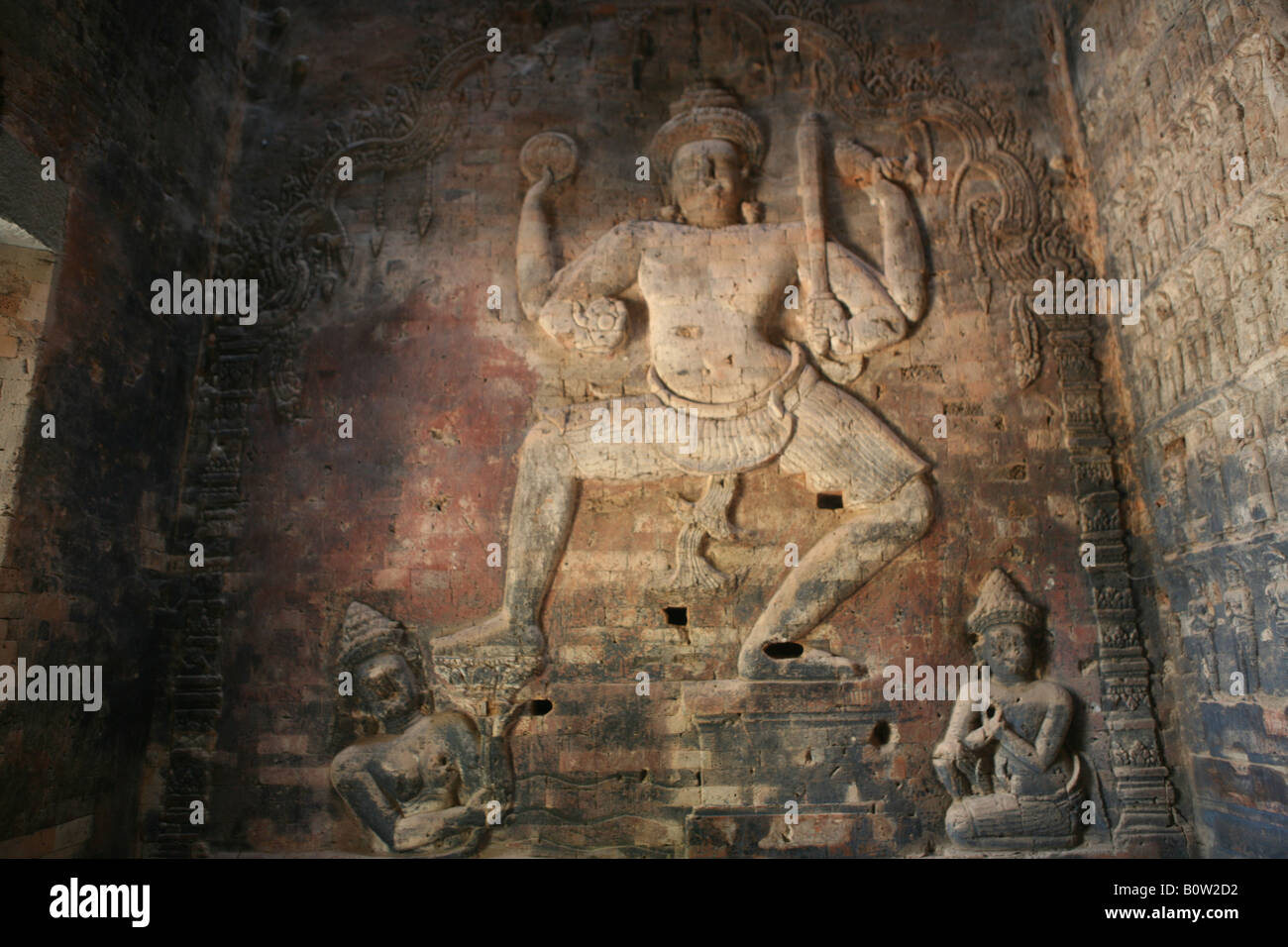 Brick relief depicting Vishnu crossing the cosmic ocean with 4 ...