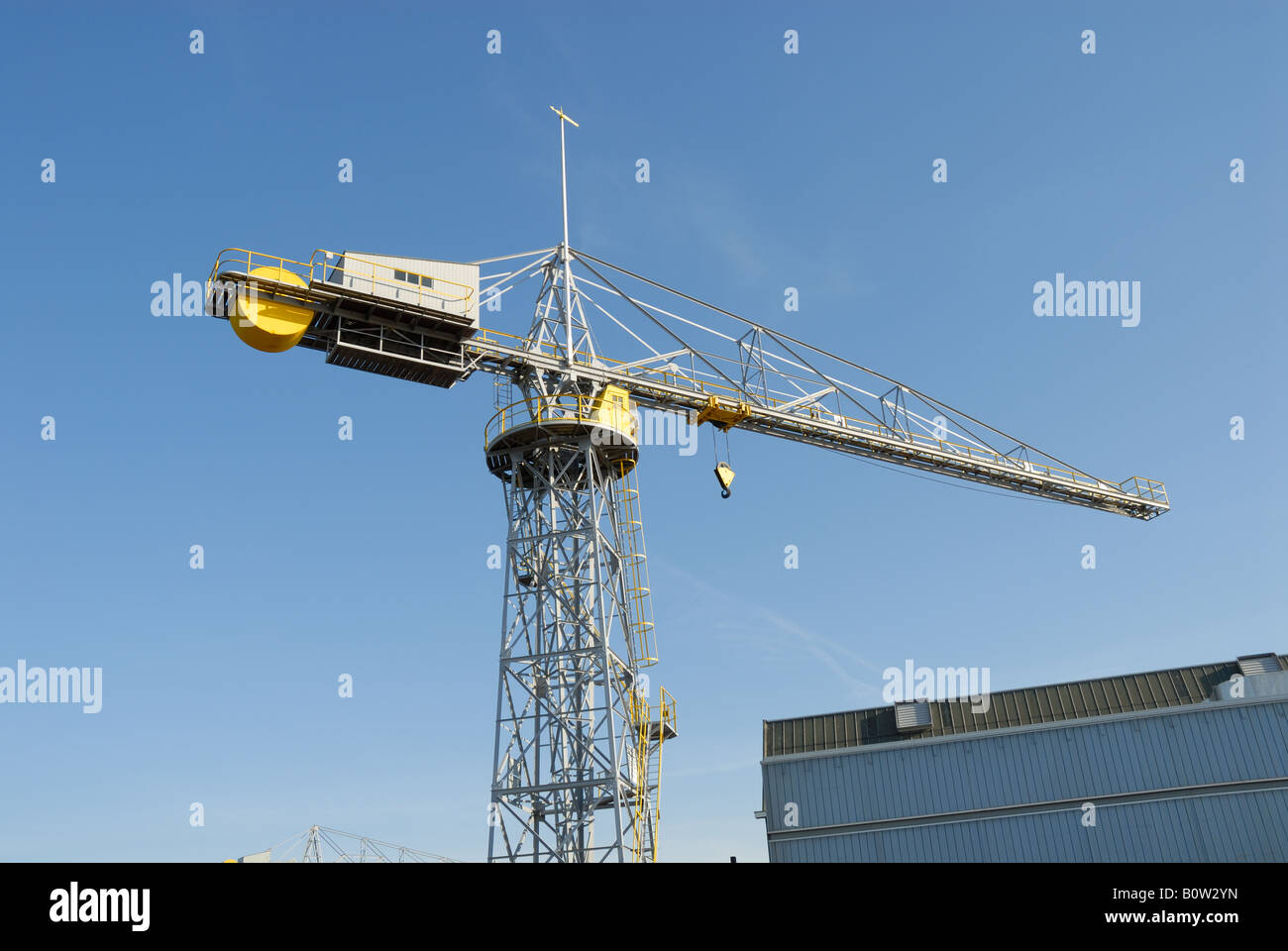 Cargo crane at harbor Stock Photo - Alamy