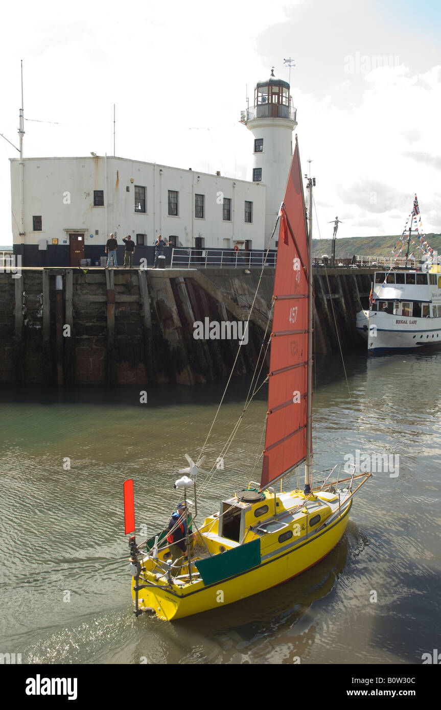 Junk rigged yacht departing from Scarborough harbour, North Yorkshire ...