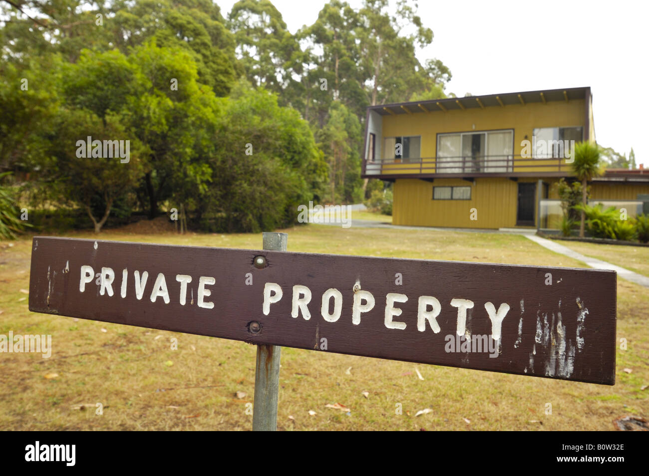 An Australian beach side house with a private property sign Stock Photo ...