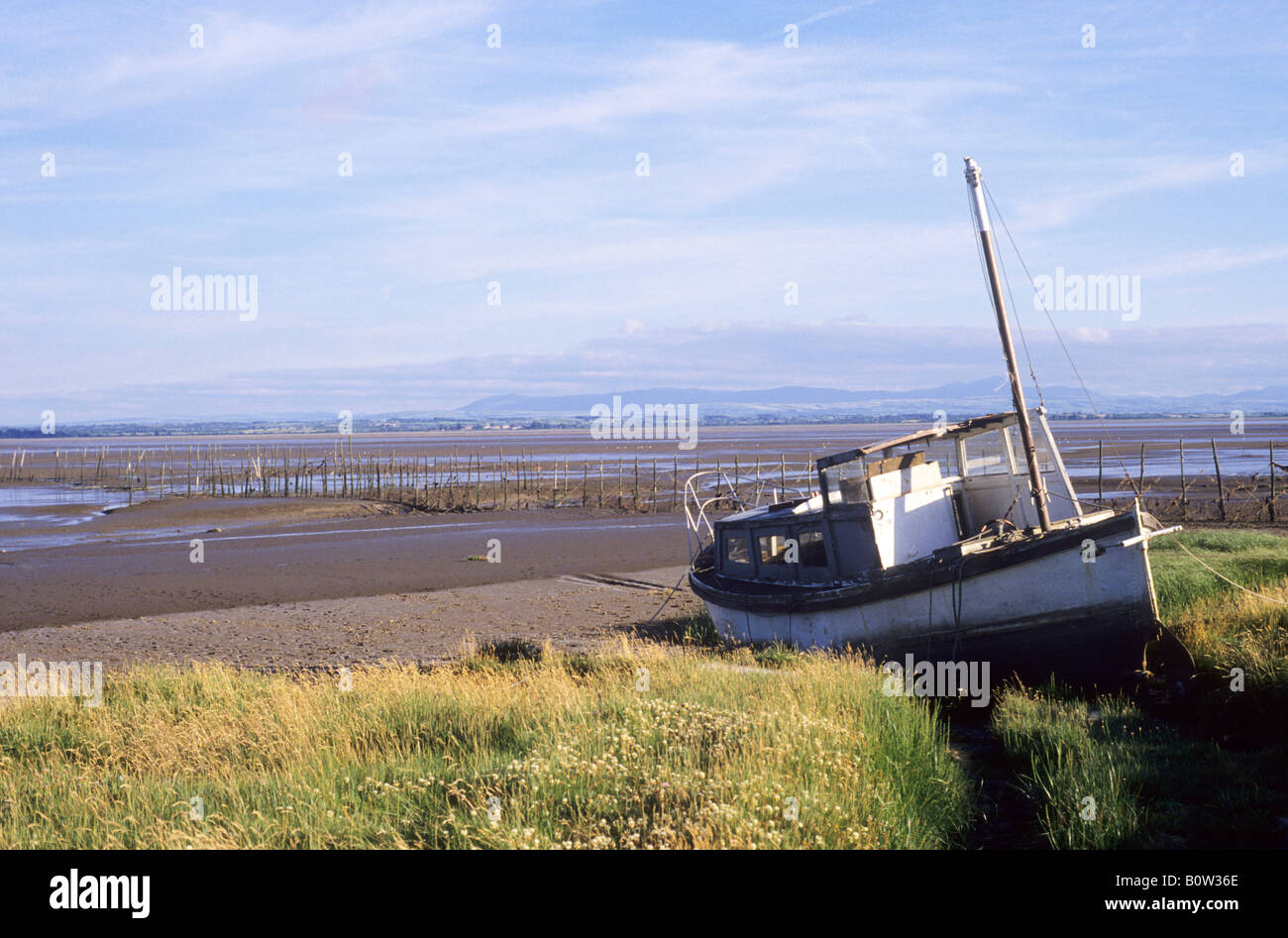 Solway Firth from Scottish side fish traps low tide fishing boat coast ...